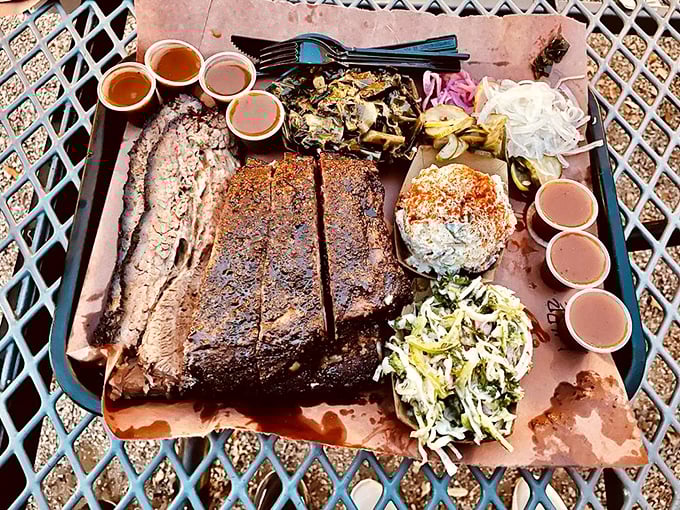 The barbecue equivalent of a greatest hits album—brisket, sides, and sauces arranged like edible artwork on butcher paper.