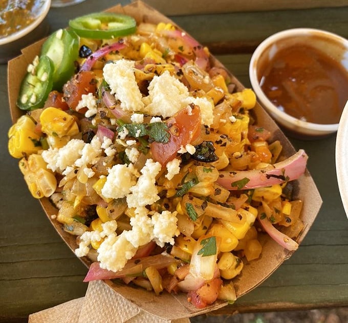 This isn't just corn salad – it's summer on a plate, with sweet kernels, pickled onions, and crumbled cheese playing a symphony of flavors.