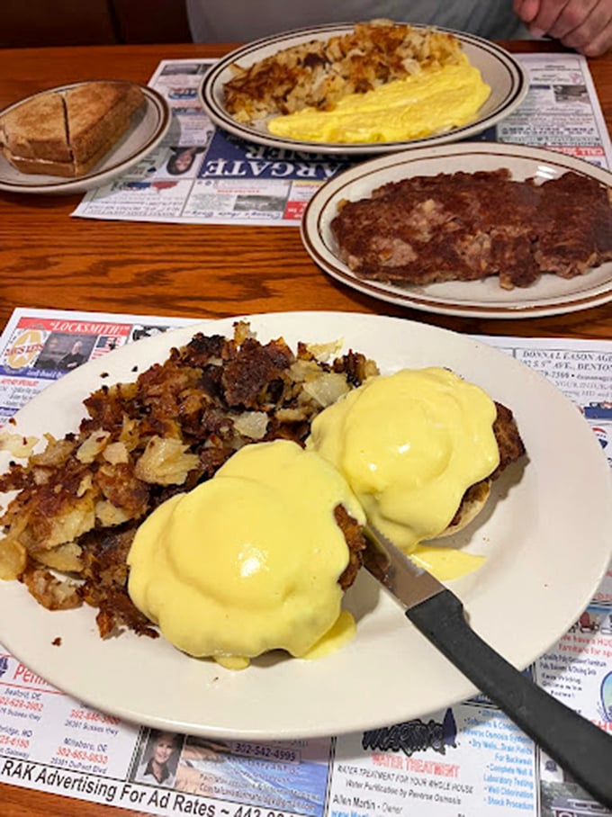 Eggs Benedict gets the coastal treatment with crab and hollandaise. This plate doesn't just feed you—it hugs your soul.