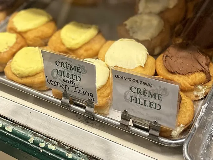Cream-filled treasures topped with buttercream frosting. These aren't just donuts—they're dessert engineering that would make NASA scientists weep with joy.