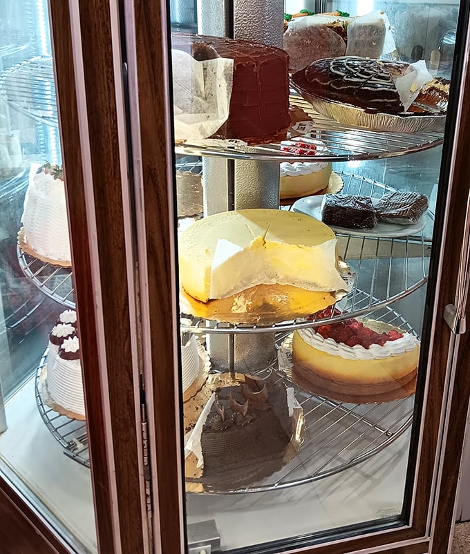 The dessert case – where willpower goes to die and "I'll just have a bite" becomes the lie we tell ourselves. 