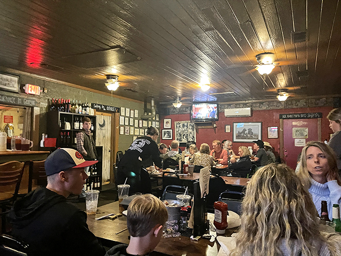 The dining room hums with the energy of people who know they've found something special. Notice the lack of phones—the food commands full attention.