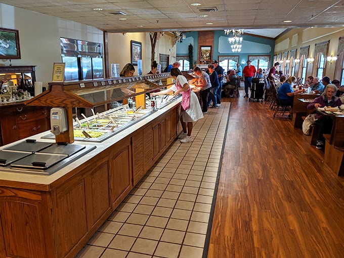 The buffet line at Amish Door—where patience is rewarded with platters of homestyle cooking. Notice nobody's rushing; they know good things await.