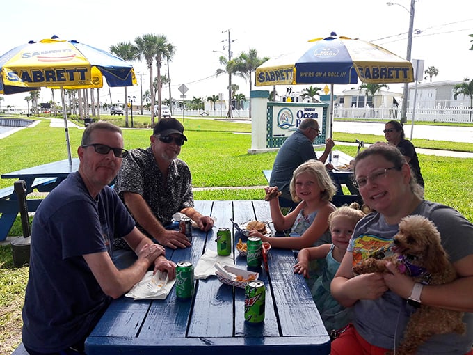 Nothing beats waterfront dining with hot dogs this good – pure Florida living at its finest.