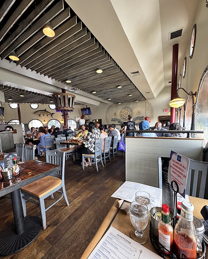 The bustling dining room proves that Baltimoreans know the secret to happiness: good company, wooden tables, and the promise of seafood.