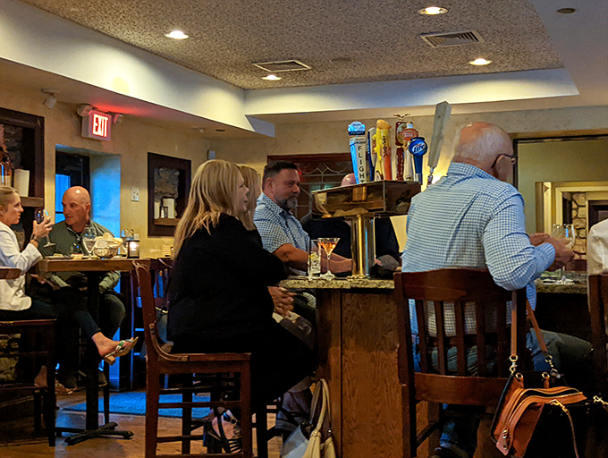 The bar area hums with that perfect energy—where strangers become friends and "just one drink" turns into dinner plans.