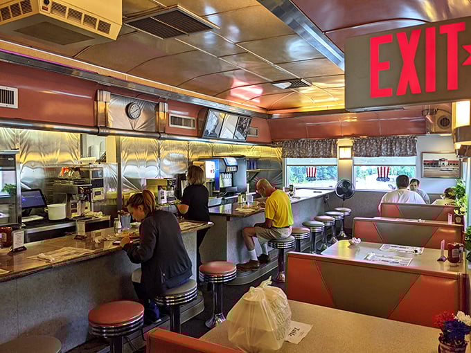 Diner democracy in action—where everyone from construction workers to office managers finds common ground in the pursuit of perfect eggs.