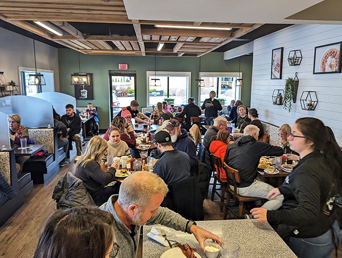 The weekend breakfast rush – where strangers become temporary family, united by the universal language of coffee and pancakes.