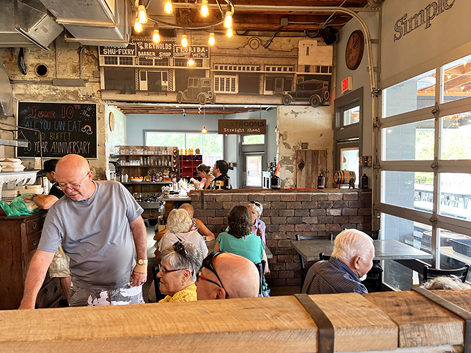 The dining room hums with the universal language of satisfied customers – that quiet murmur punctuated by occasional "mmms" and clean plates.