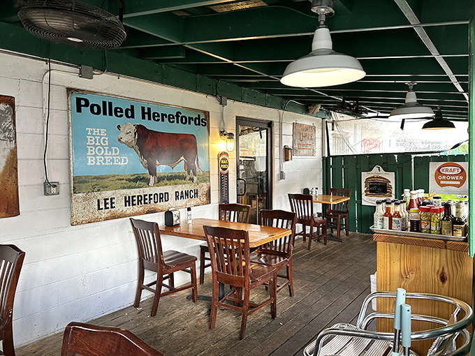 The dining area feels like your favorite uncle's porch—if your uncle collected vintage cattle signs and perfected the art of rustic charm.