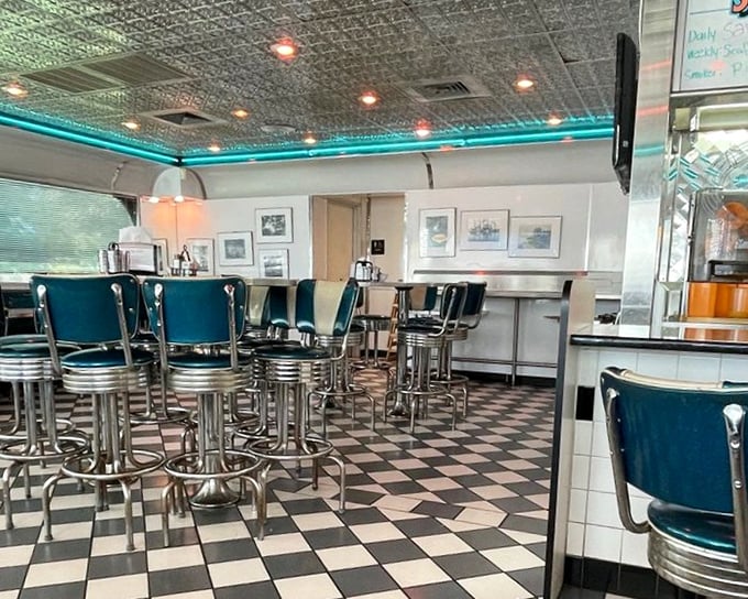 The counter stools aren't just seating—they're front-row tickets to the breakfast show, where coffee flows and locals share the morning news.