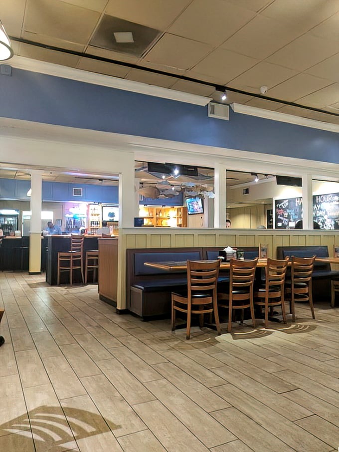 The dining area strikes that elusive balance—casual enough for flip-flops, nice enough for date night, and comfortable enough to linger over that second glass of wine.