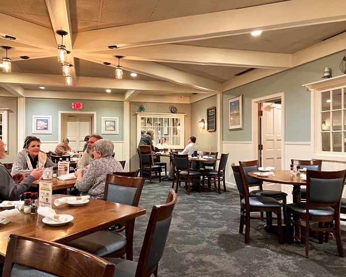 The dining room balances nautical charm with comfortable elegance, like your seafaring uncle's living room—if your uncle had impeccable taste and a cleaning service. 