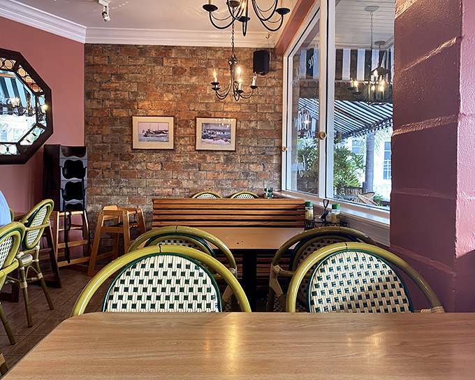 The dining room feels like your stylish friend's place—the one who actually bought matching furniture instead of collecting hand-me-downs.