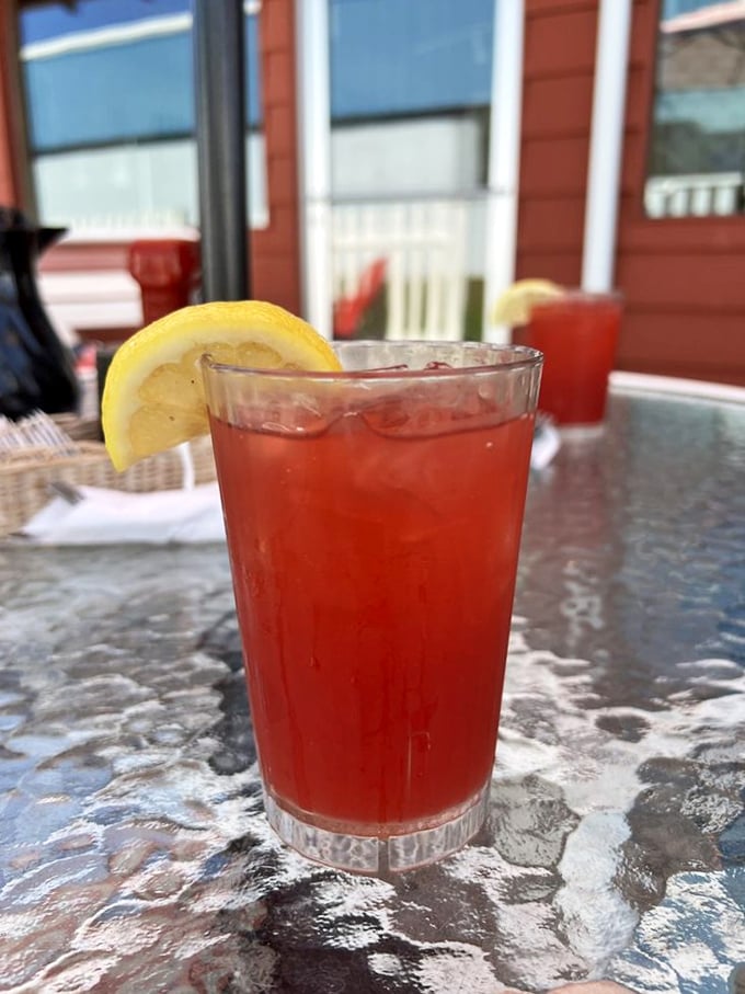 Cherry ade with a lemon wedge – summer in a glass. The perfect companion for watching boats drift by on Crystal Lake.