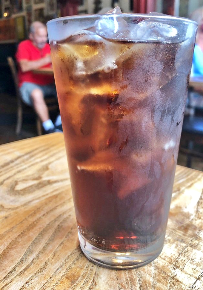 
Even the drinks at Uncle John's come with a side of nostalgia. This ice-cold cola in a proper glass tumbler makes everything taste better. 