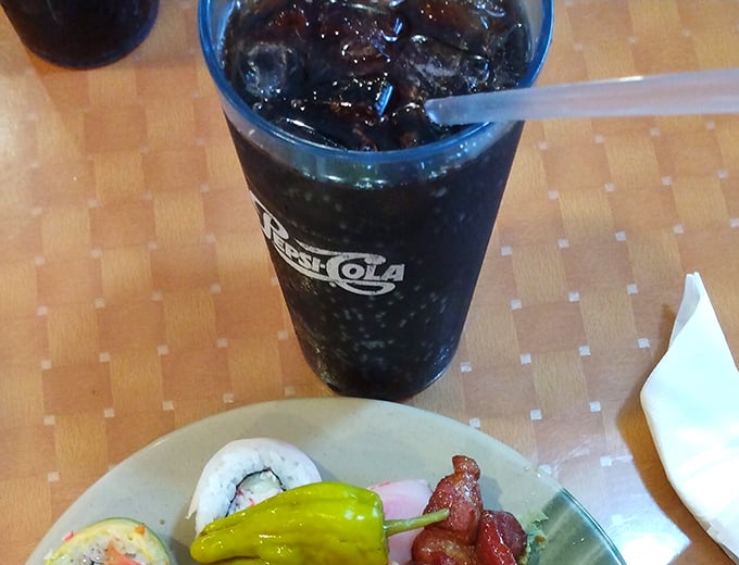Even the drinks at Mizumi get special attention. That cola isn't just washing down your meal—it's providing strategic stomach expansion.