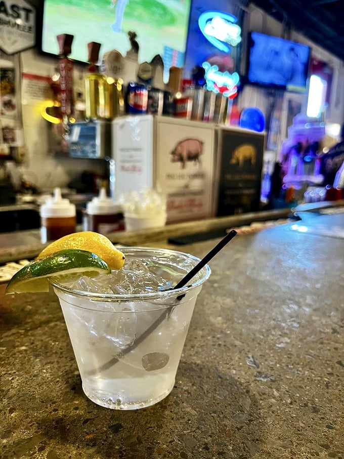 That's not just a cocktail—it's a palate cleanser between bites of smoky perfection, with lime and lemon standing by for citrus reinforcement.