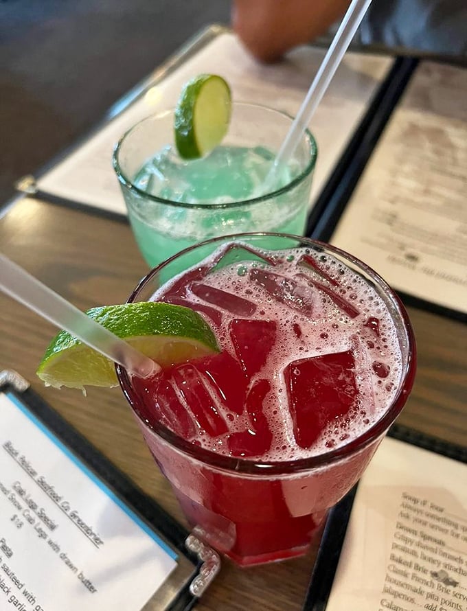 Cocktails that match the coastal vibe—vibrant, refreshing, and guaranteed to wash away whatever stress you brought through the door.
