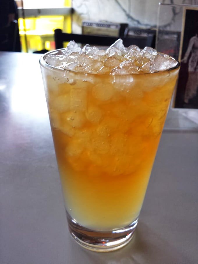Sweet tea served properly—ice-cold, amber-hued, and sweet enough to make your dentist wince but your soul sing.