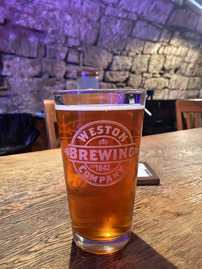 Beer and stone walls—a pairing as old as civilization itself. This Weston Brewing Company pint looks right at home against its limestone backdrop.