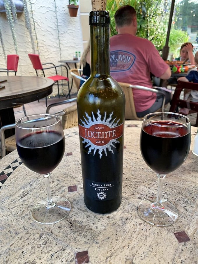 Wine o'clock in paradise—this Tuscan red doesn't just complement your meal, it transforms your patio table into a piazza somewhere in Italy.