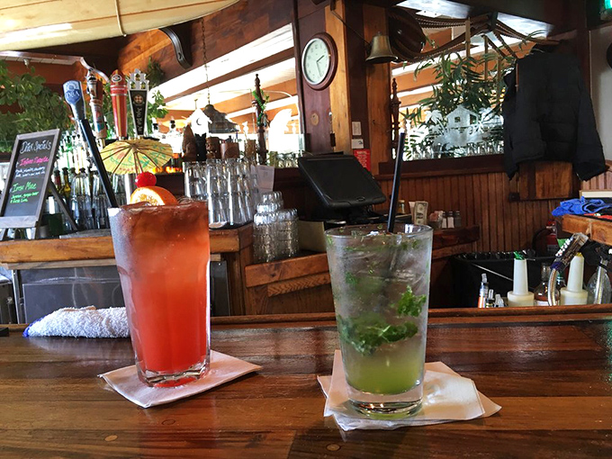 The bar serves up colorful liquid sunshine in glasses—because what's a coastal meal without a properly festive beverage?