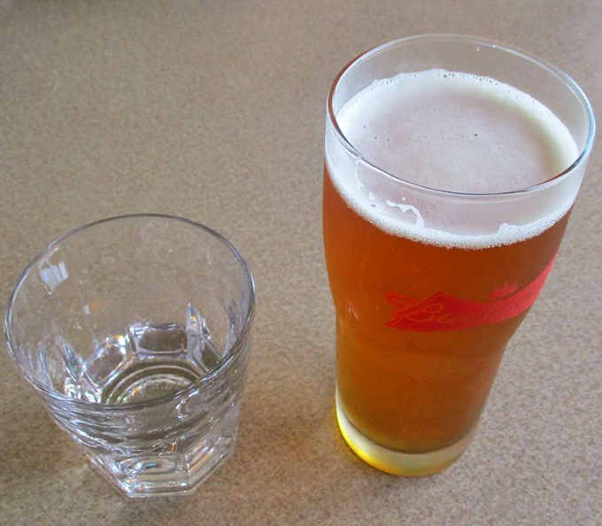 A cold beer alongside a water chaser—the perfect companion to cut through the richness of seafood and prepare you for the next delicious bite.