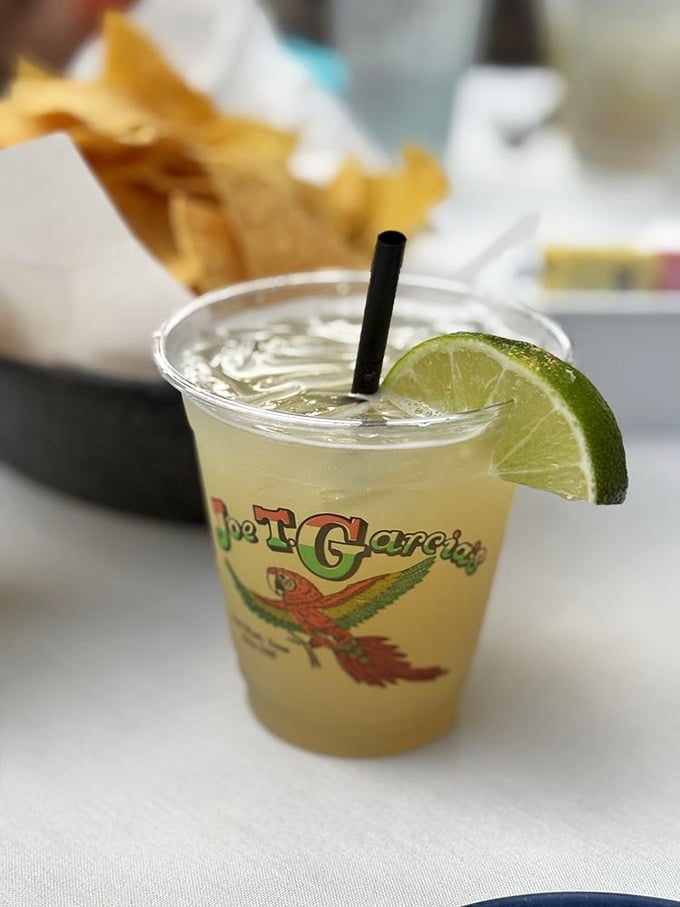 The famous tortilla soup in all its glory—a bowl of liquid sunshine garnished with lime and the promise of a better day.