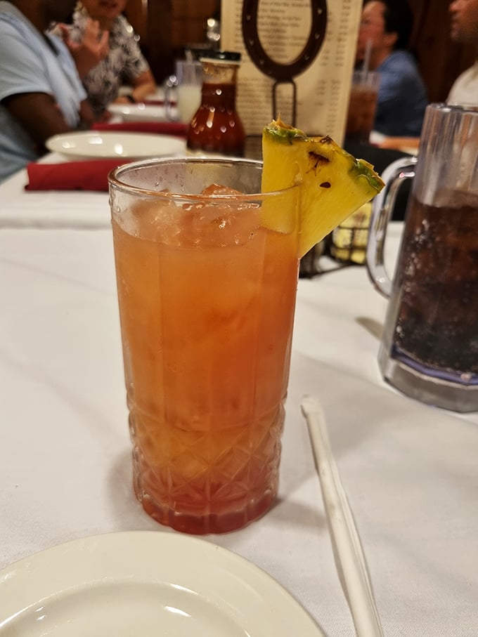A proper cocktail isn't just a drink—it's a statement of intent. This tropical-tinged beauty says, "Yes, I'm at a steakhouse, but I'm keeping my options open."