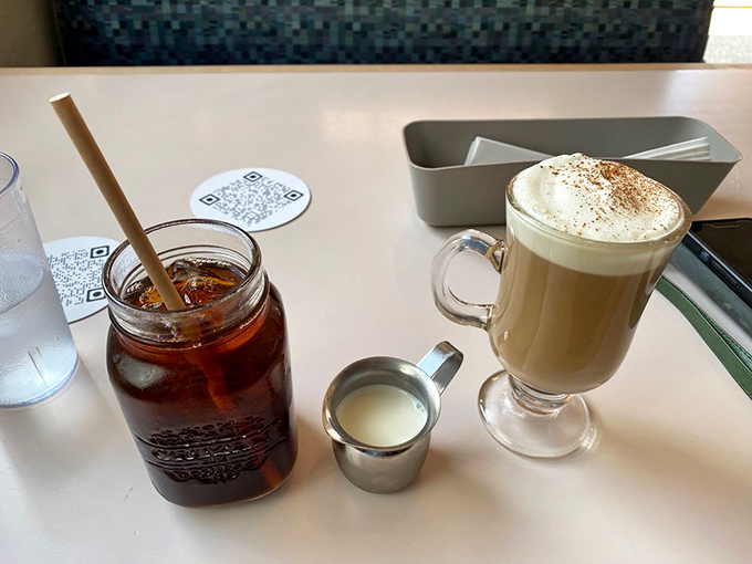 Coffee served in a mason jar alongside a proper cappuccino—because The Mont understands that breakfast beverage preferences are deeply personal constitutional rights.
