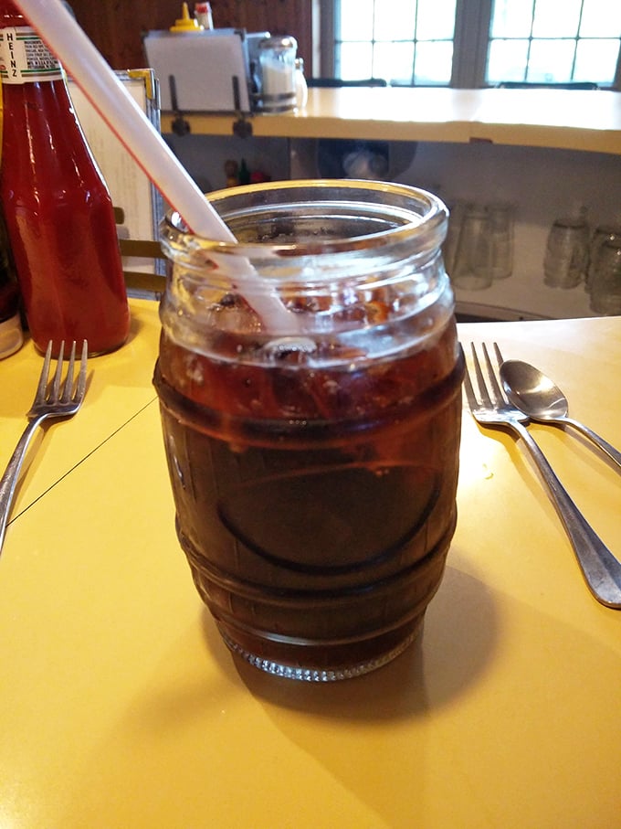 They serve drinks in mason jars because everything tastes better with a side of nostalgia. It's not just a beverage—it's a time machine. 