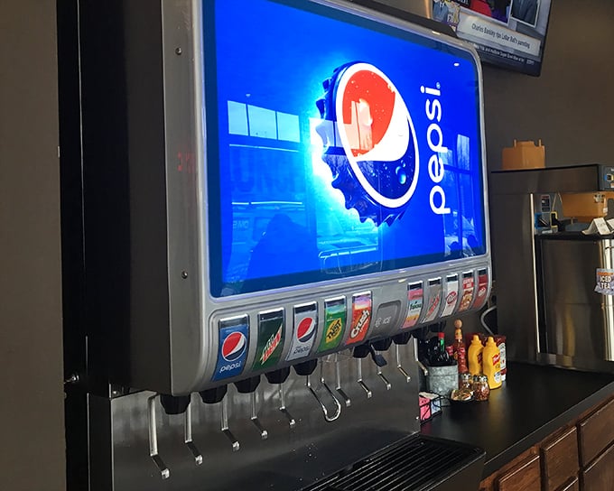 The soda fountain—where you'll contemplate life's important questions, like whether to get a refill before or after your meat sweats begin.