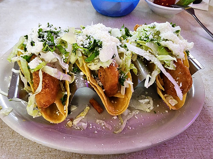 These fish tacos aren't just a meal, they're a beach vacation for your taste buds – crispy fish, fresh cabbage, and a sprinkle of cotija cheese.