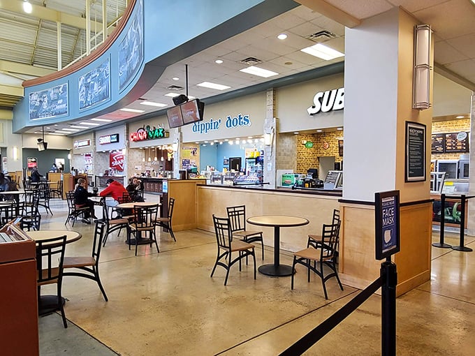 The food court—that essential refueling station where shopping warriors gather strength before diving back into the bargain fray.