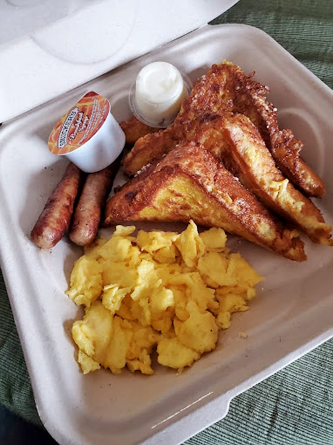 French toast that achieves the impossible—crispy exterior, custardy interior, and enough maple syrup to make Canadians jealous.
