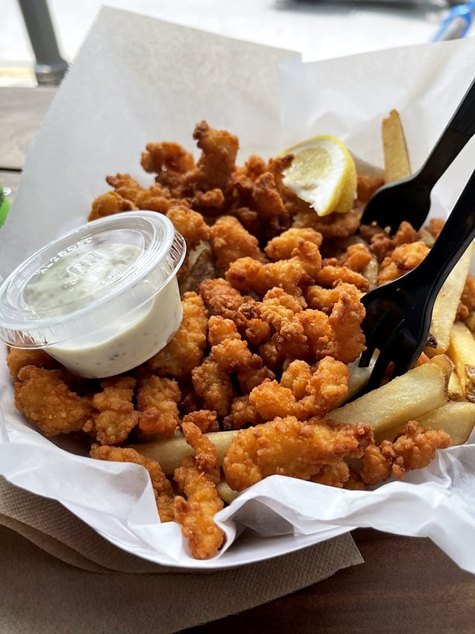 Ipswich fried clams looking like golden nuggets from a delicious treasure chest – whole bellies and all.