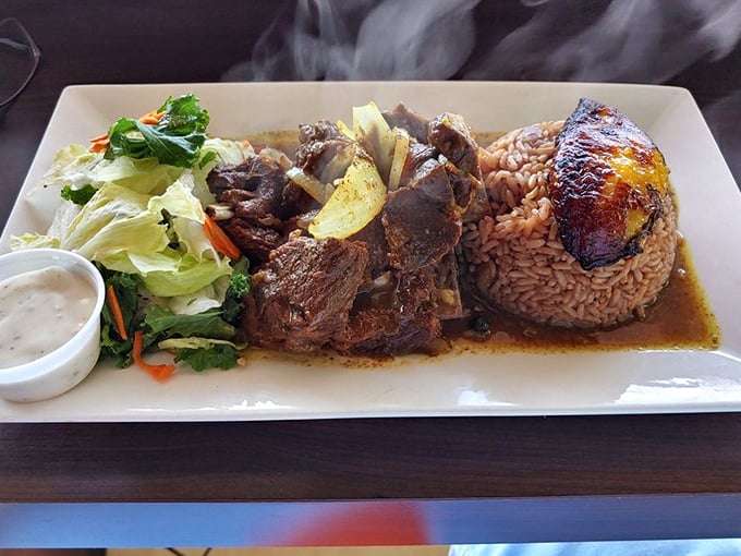 Goat curry that's been slow-cooked to tender perfection—the kind of dish that makes you close your eyes and sigh with each bite.