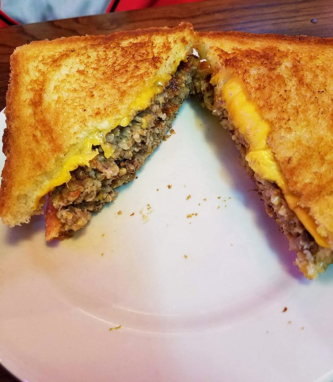 Not your childhood grilled cheese—this grown-up version hides a savory secret between perfectly toasted bread that crackles with each heavenly bite.