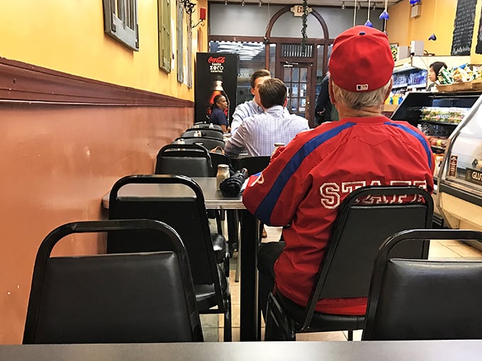 The narrow counter seating creates a front-row view to sandwich artistry—and sometimes the best conversations with fellow food pilgrims.