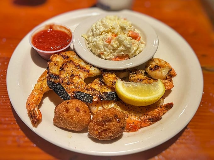 Gulf shrimp, hushpuppies, and coleslaw – the holy trinity of coastal dining that makes you want to send a thank-you note to the ocean.