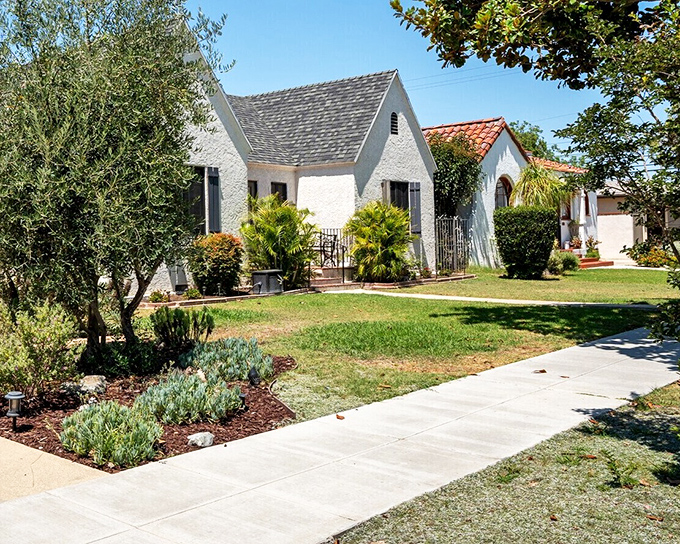 Charming bungalows with drought-tolerant gardens showcase Long Beach's architectural heritage—each one potentially hiding vintage treasures behind those Spanish-style doors.