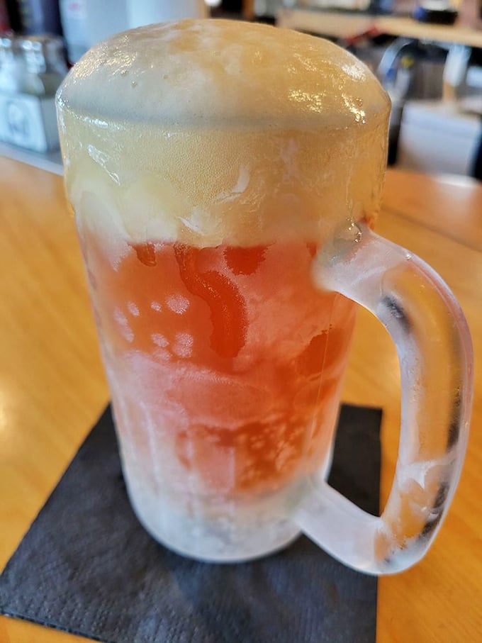 A frosty mug of sweet tea so cold it's wearing its own sweater. In Florida heat, this isn't just a beverage—it's survival equipment.