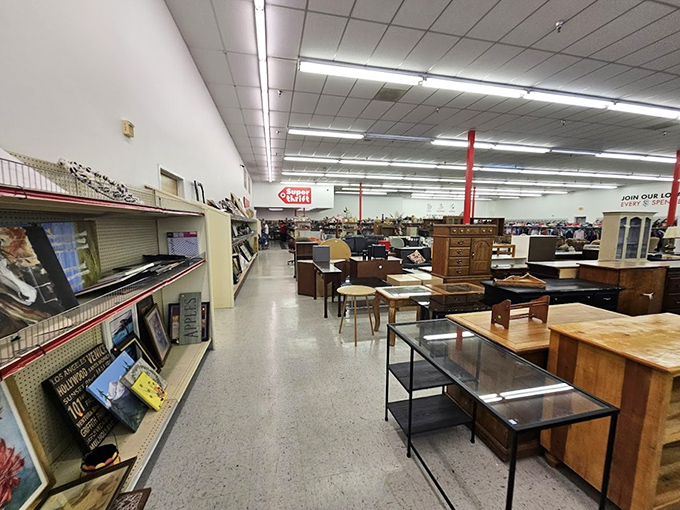 Navigate aisles of possibility where dining tables and desks create a wooden maze of potential. Every piece has lived a previous life.