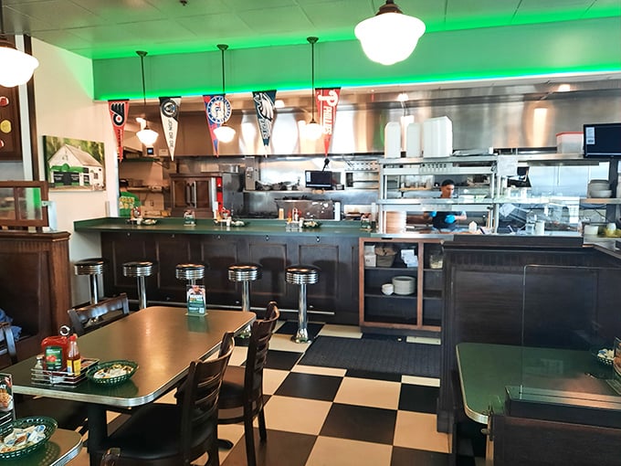 The open kitchen isn't just for show – it's dinner and a performance, where short-order cooking becomes culinary theater.