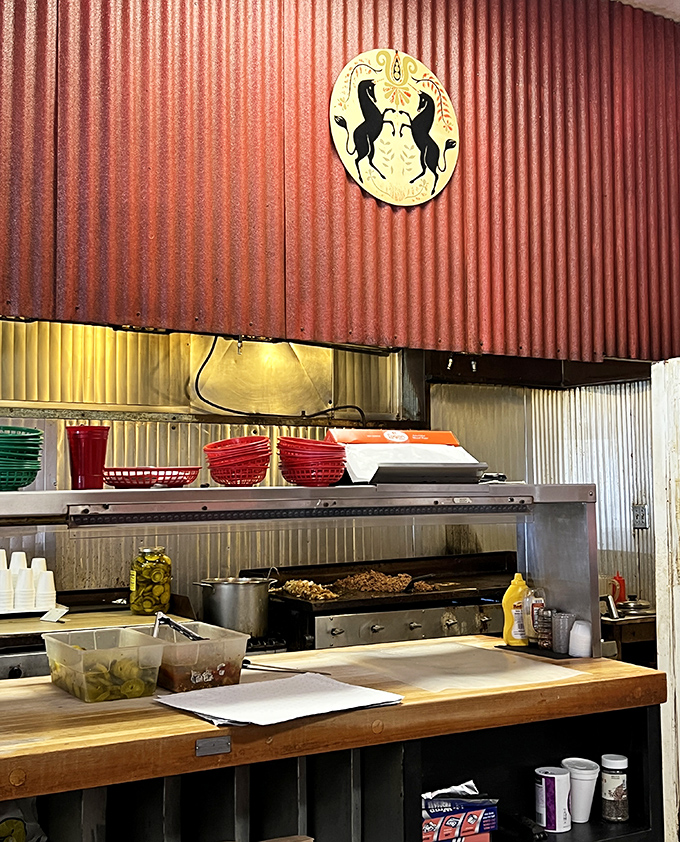 Where the magic happens – Zandy's kitchen with its well-seasoned grill has been turning out consistent perfection since Harry Truman was president.