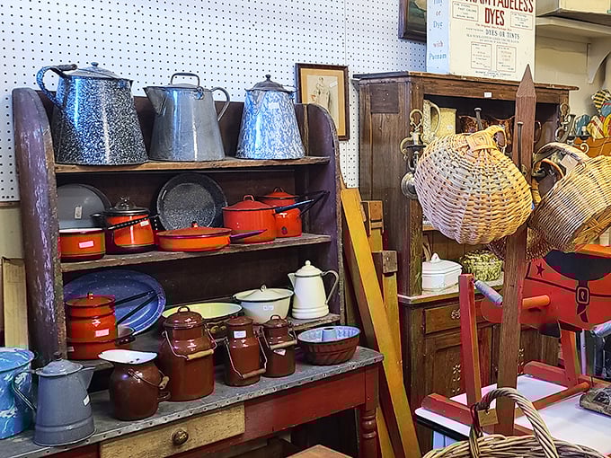 Kitchen nostalgia in technicolor! Those flame-orange enamel pots probably cooked Sunday dinners for families who gathered without smartphones.
