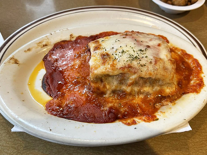 Lasagna that doesn't mess around – layers of pasta, cheese, and sauce in portions that ensure you'll be taking some home for tomorrow.