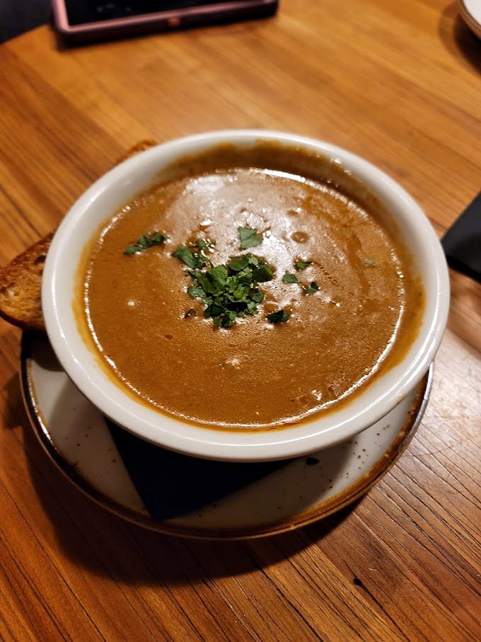 This isn't just soup—it's liquid comfort in a bowl, topped with a sprinkle of fresh herbs that whisper "homemade."