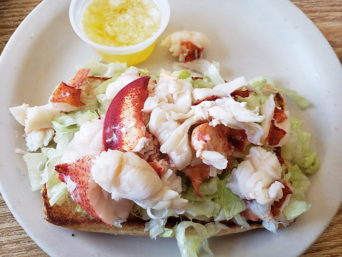 This lobster roll doesn't play games – just sweet chunks of lobster meat nestled on crisp lettuce, letting the star of the show shine.